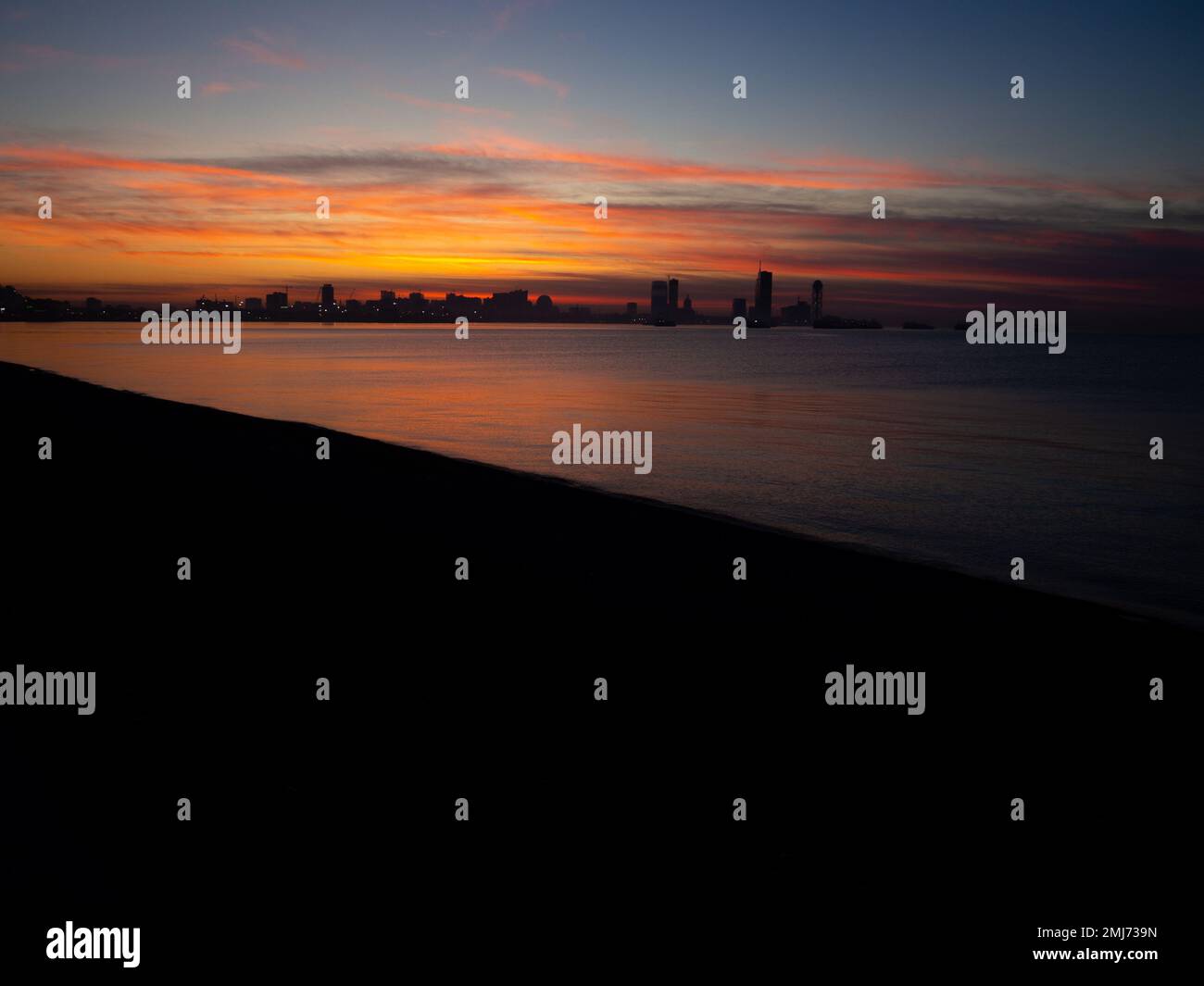 Batumi at sunset. Sights of Georgia in the evening. Red sunset. View of ...