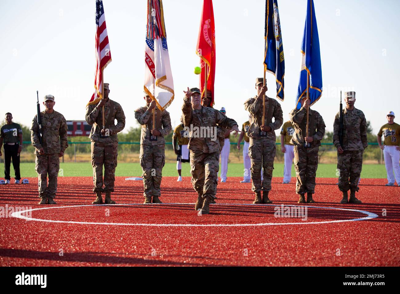 Fort Sill Garrison Commander Col. James Peay throws out the first pitch ...