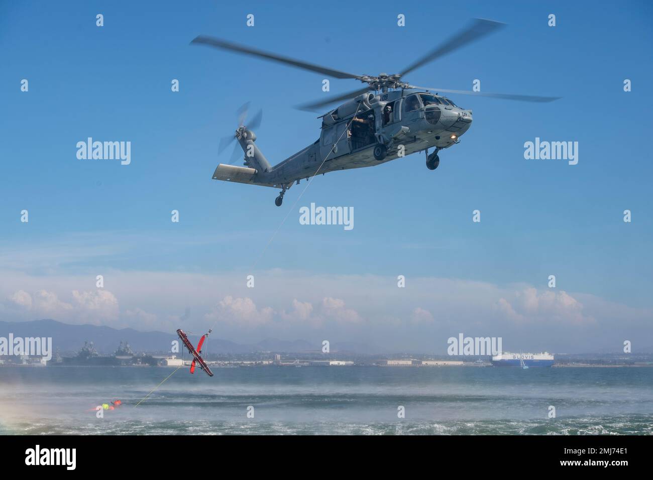 220825-N-EV253-1154 SAN DIEGO (Aug. 25, 2022) – The crew of an MH-60S ...
