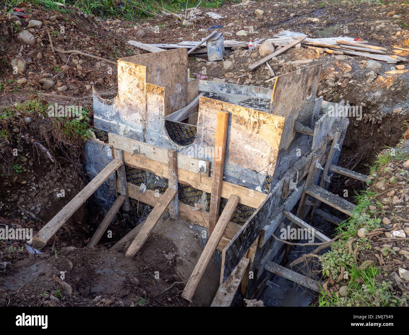 Work with sewer networks. Filling with concrete. Construction of a ...