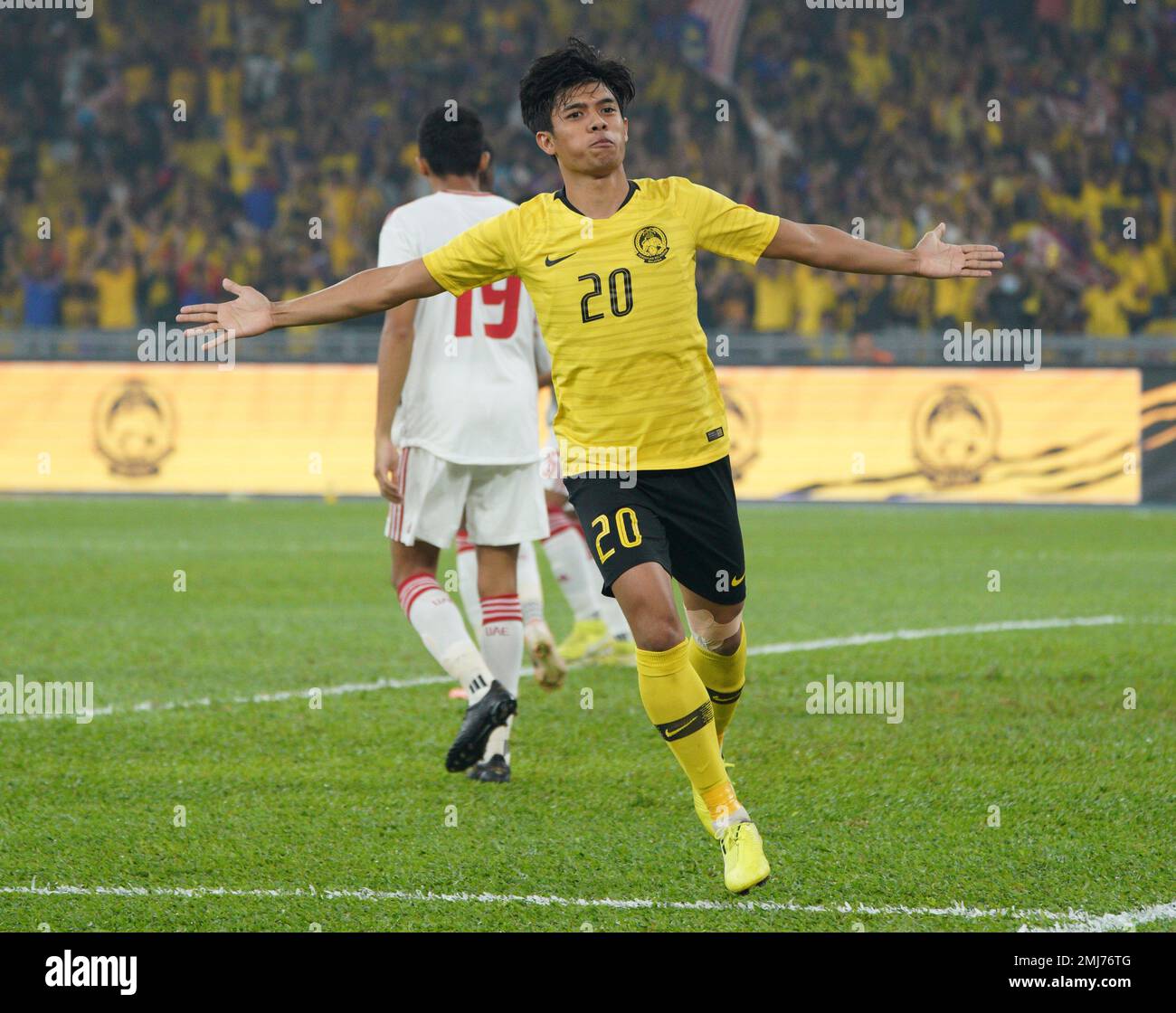 Malaysia's Muhammad Syafiq Ahmad celebrates after scoring during the ...