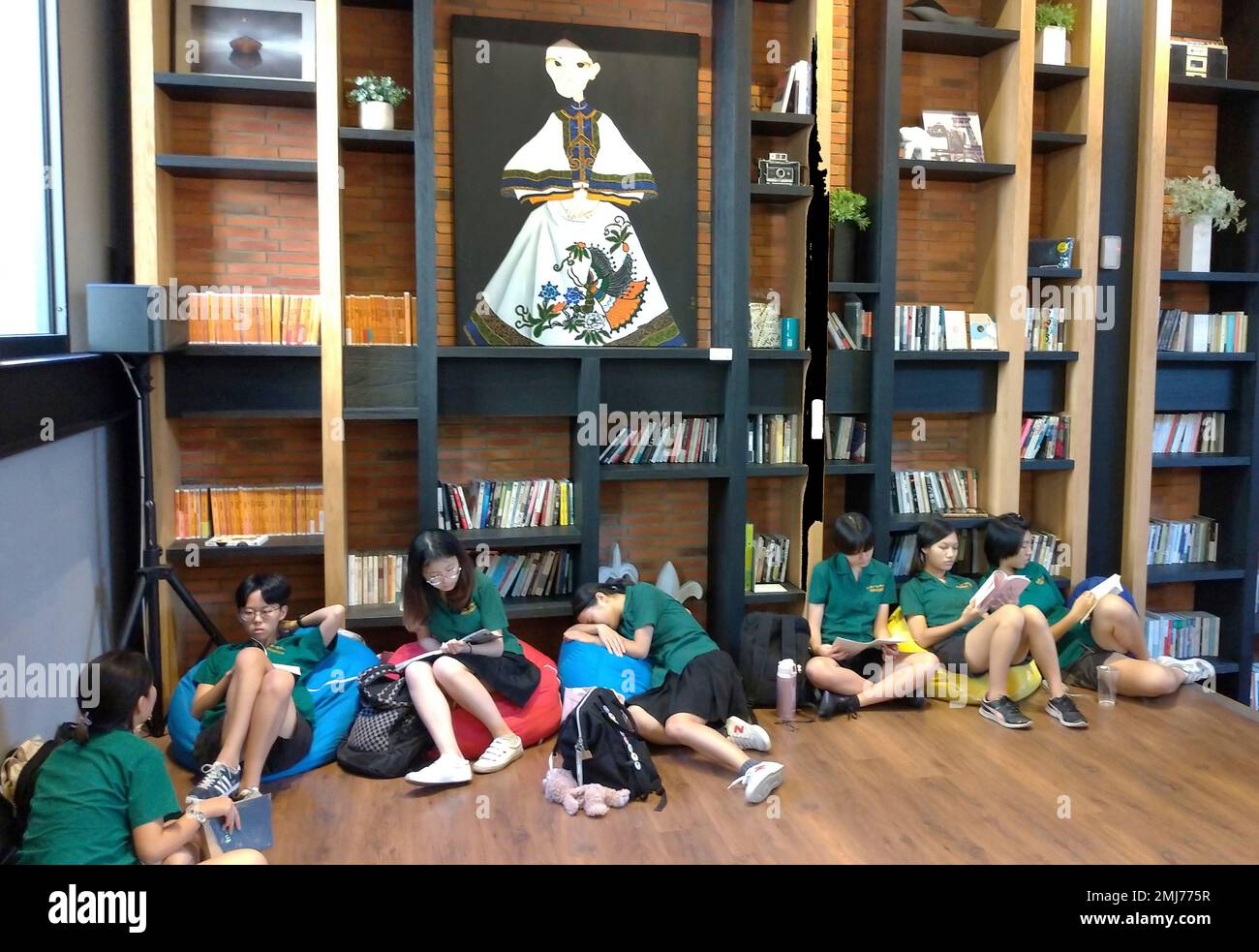Taiwanese students sit and read at a book store in Taipei, Taiwan ...