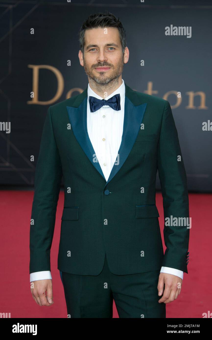 Robert James-Collier poses for photographers upon arrival at the World ...