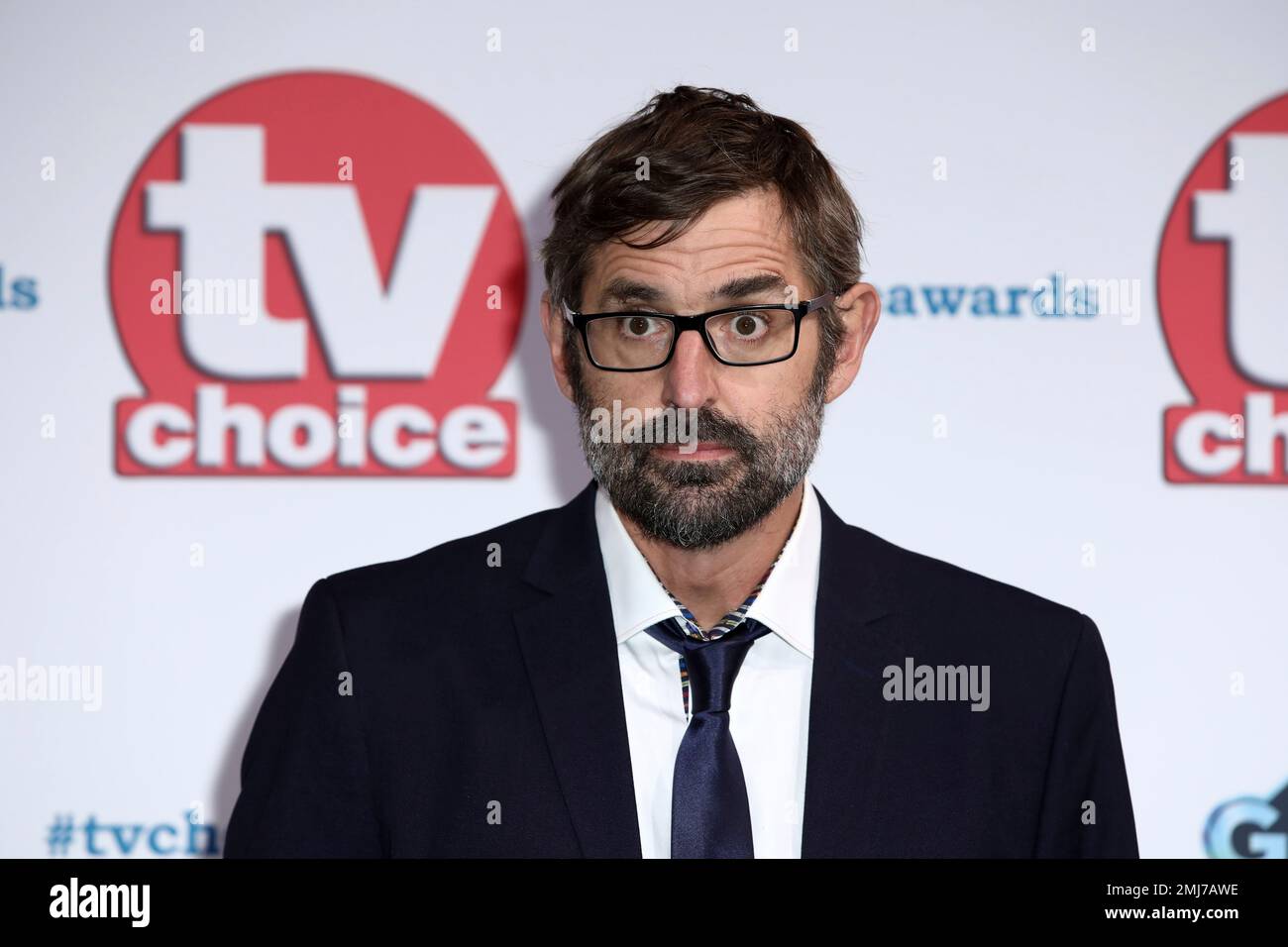 Documentary film maker Louis Theroux poses for photographers on arrival ...