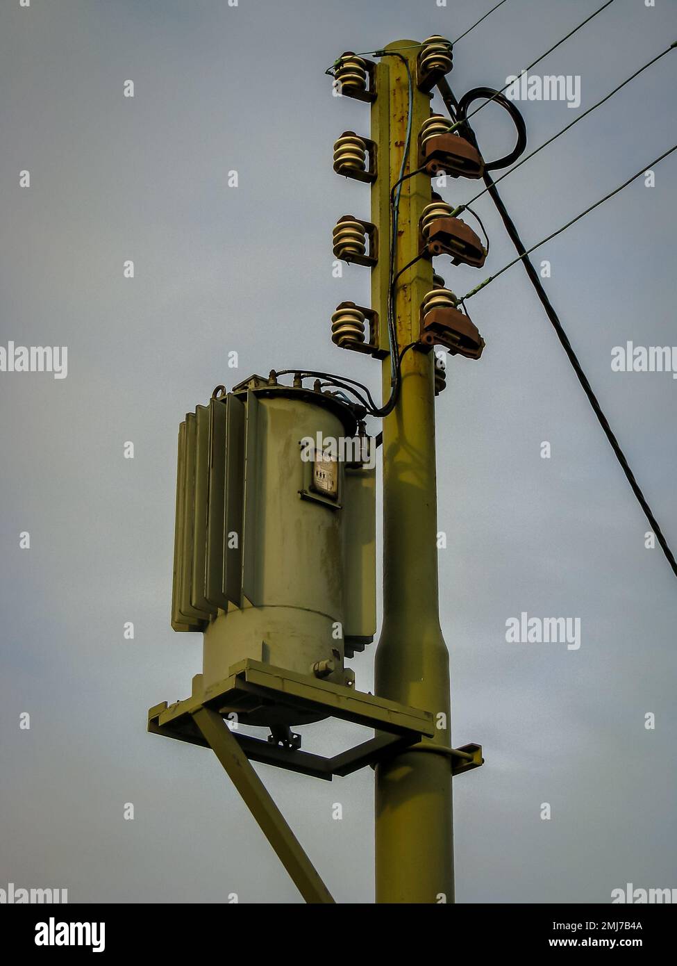 An old power pole with transformer. Overhead lines can only be found in ...