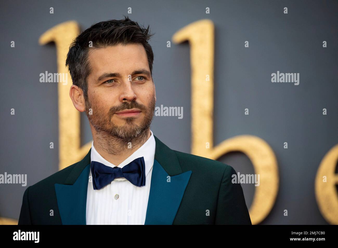 Robert James-Collier poses for photographers upon arrival at the world ...