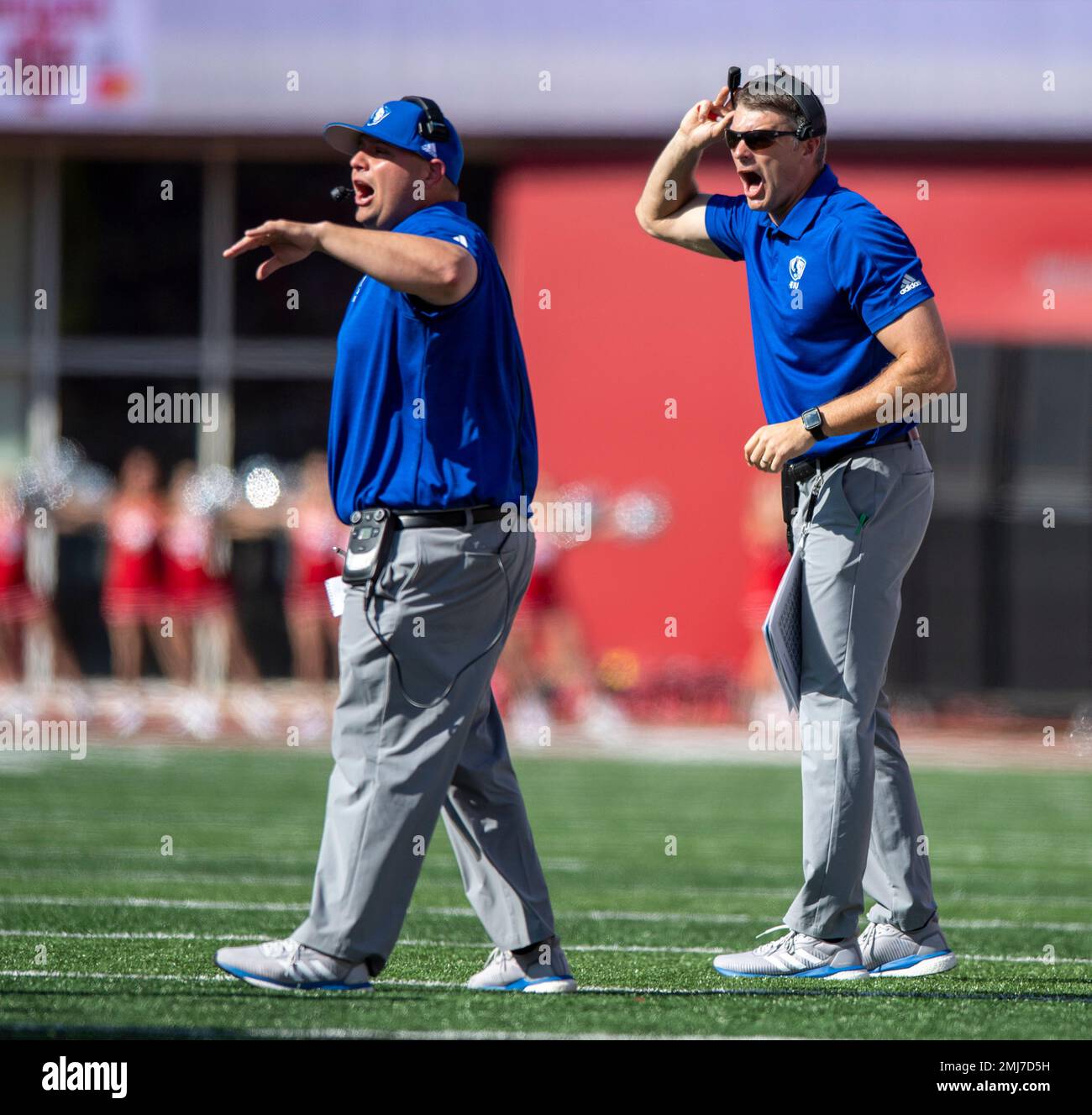 Eastern Illinois head coach Adam Cushing, right, communicates with the ...
