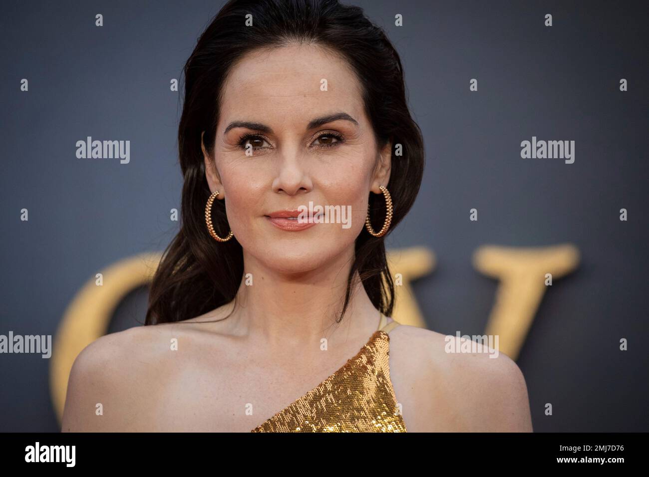 Actress Michelle Dockery poses for photographers upon arrival at the ...