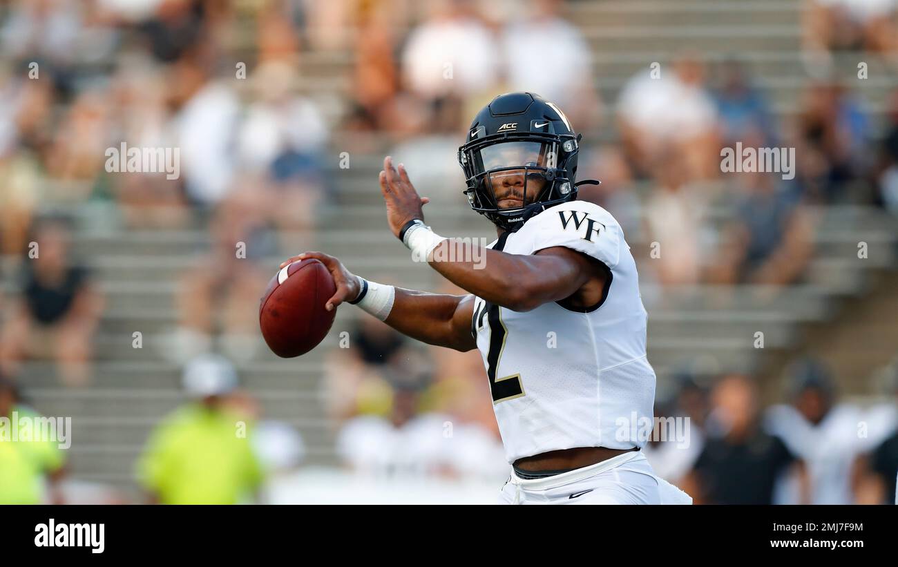 Wake Forest quarterback Jamie Newman (12) looks to pass during an NCAA ...