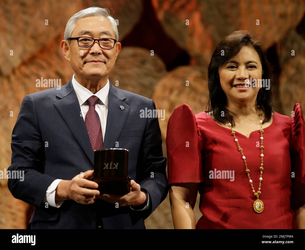 Philippine Vice President Leonor Robredo, right, poses with Ramon ...