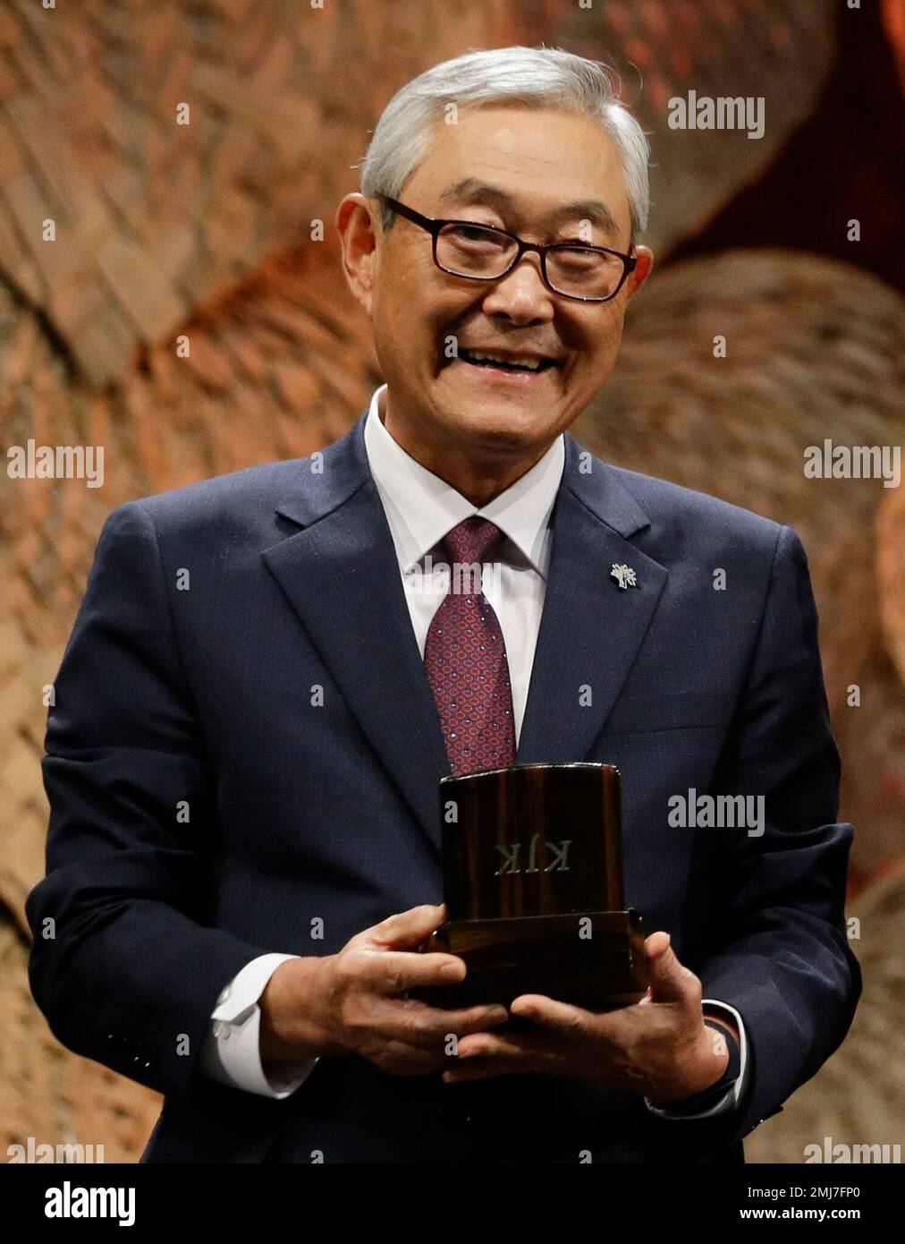 Ramon Magsaysay recipient South Korean Kim Jong-Ki smiles during ...
