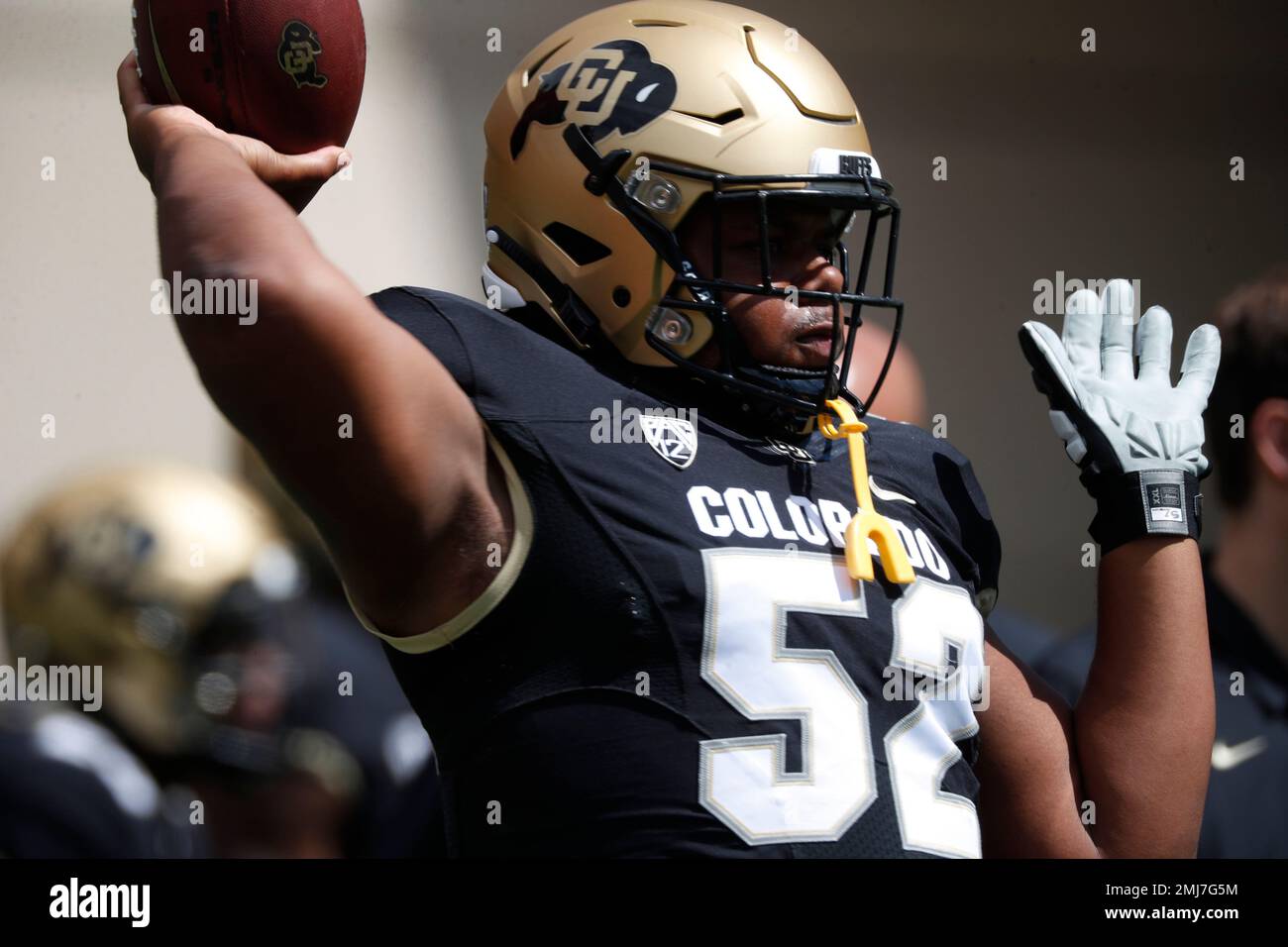 Colorado Buffaloes linebacker Alex Tchangam (52) warms up before the ...