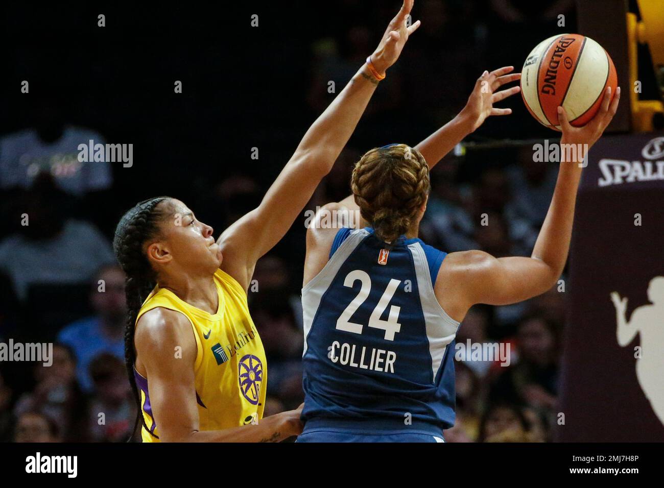Minnesota Lynx's Napheesa Collier (24) shoots under pressured by Los ...