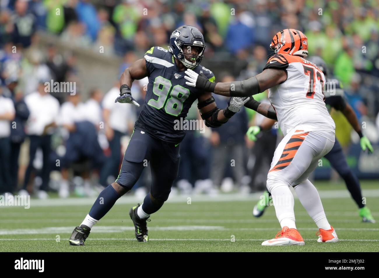 Seattle Seahawks defensive end Rasheem Green (98) lines up against ...