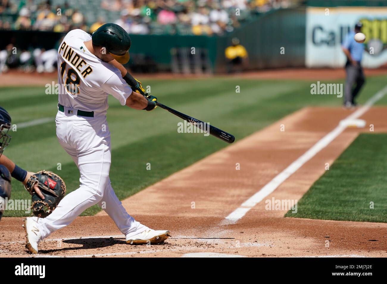 Oakland Athletics' Chad Pinder (18) gets a hit against the Detroit ...