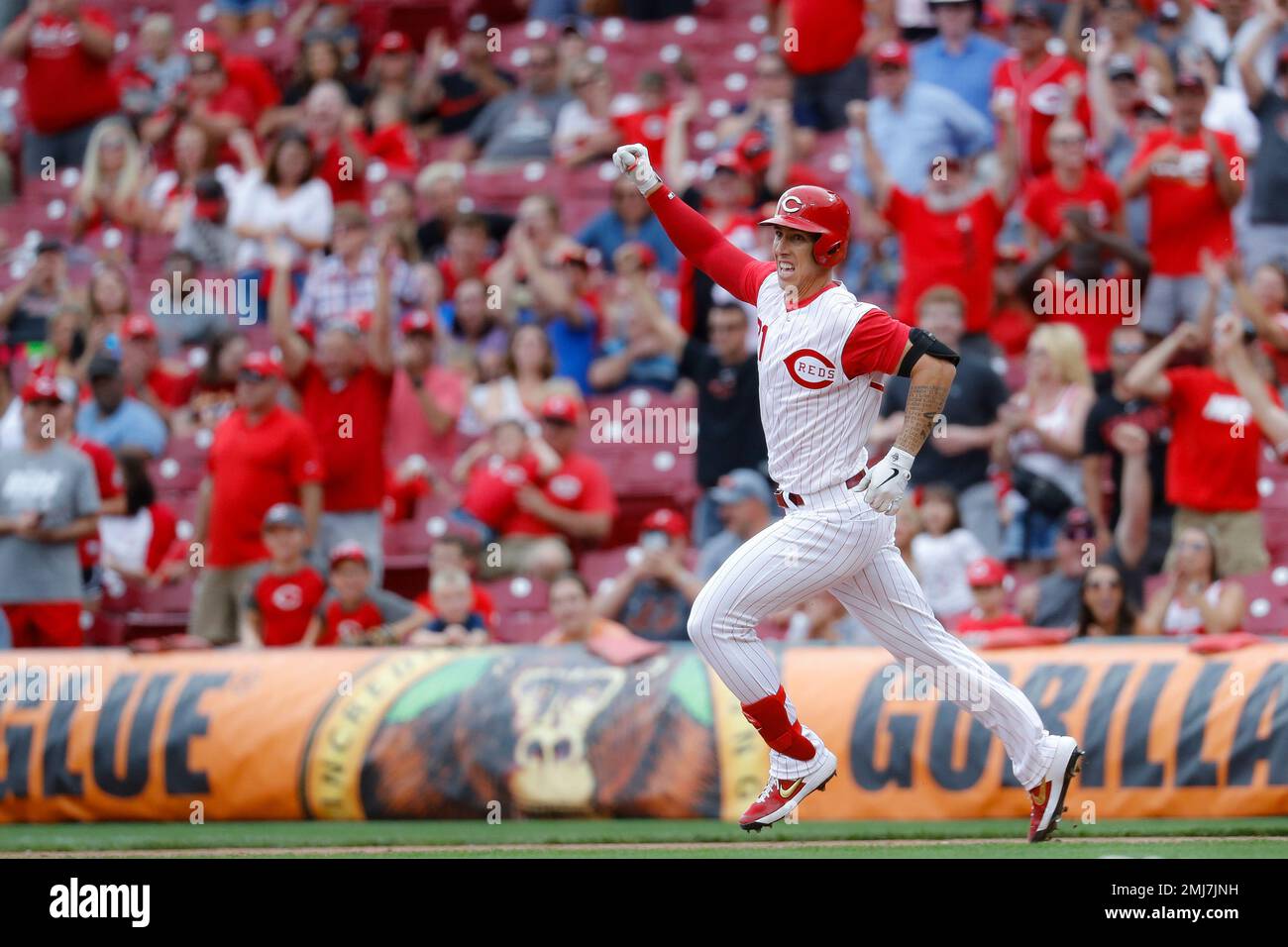 Cincinnati Reds' Michael Lorenzen celebrates after hitting a game ...