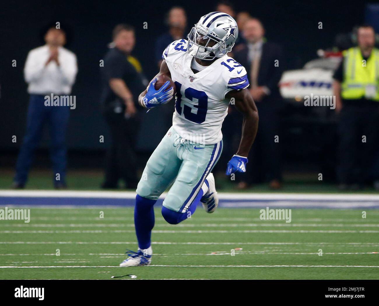 Dallas Cowboys wide receiver Michael Gallup (13) gains extra yardage ...