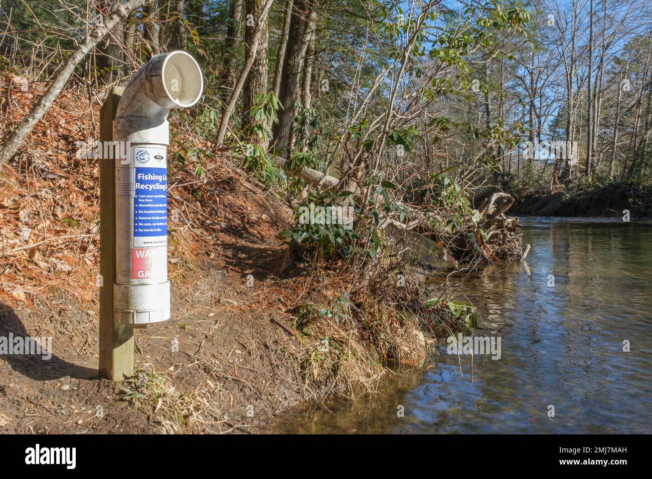 Fishing line recycling station on a post next to a river Stock Photo ...