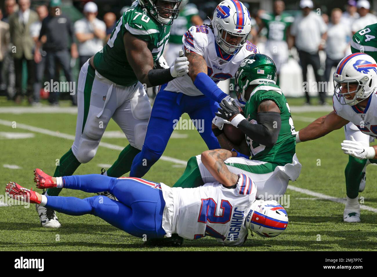 Buffalo Bills' Taron Johnson (24) and Devin Singletary (26) tackle New ...