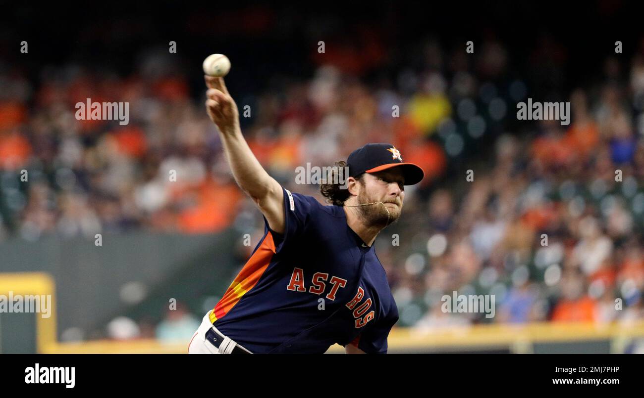 Houston Astros starting pitcher Gerrit Cole throws against the Seattle ...
