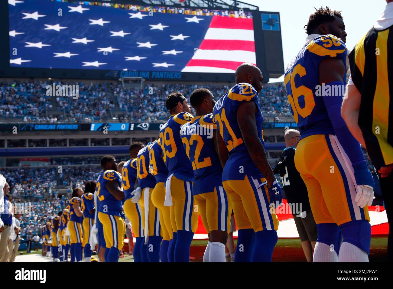 Los Angeles Rams line up during the national anthem prior to the first ...