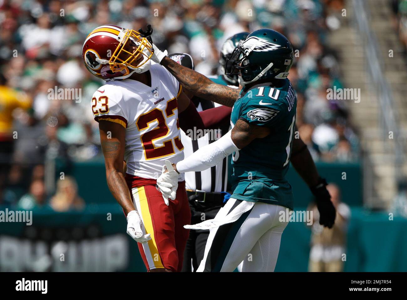 Washington Redskins' Quinton Dunbar, left, and Philadelphia Eagles ...
