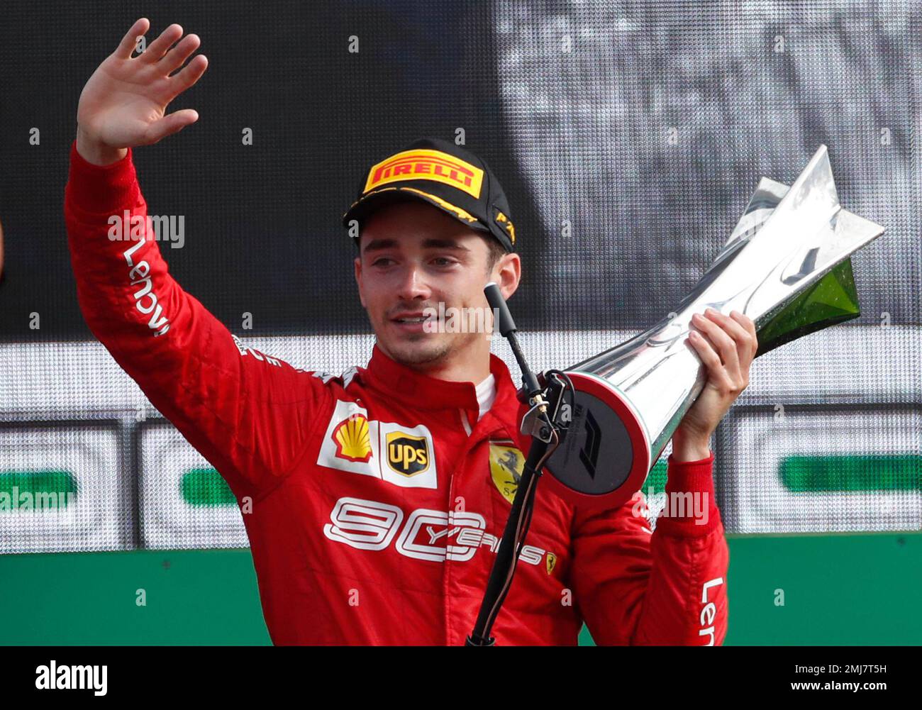Ferrari driver Charles Leclerc of Monaco celebrates on podium after ...