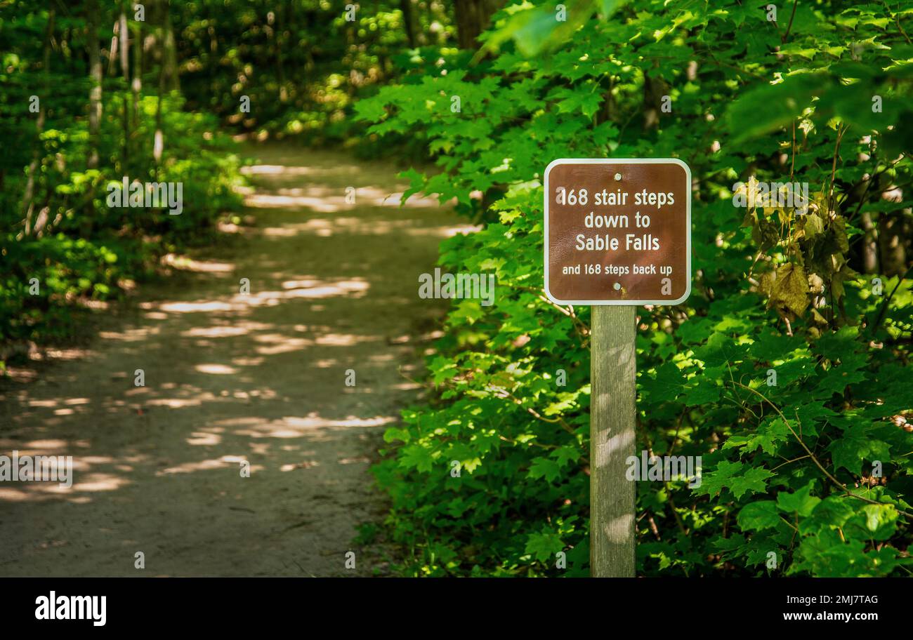 Funny Sign for distance to Sable falls attraction on woods trail head ...