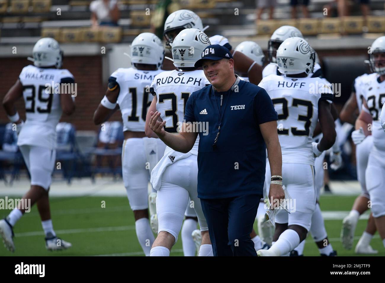 Georgia Tech head coach Geoff Collins walks the field during warm ups ...