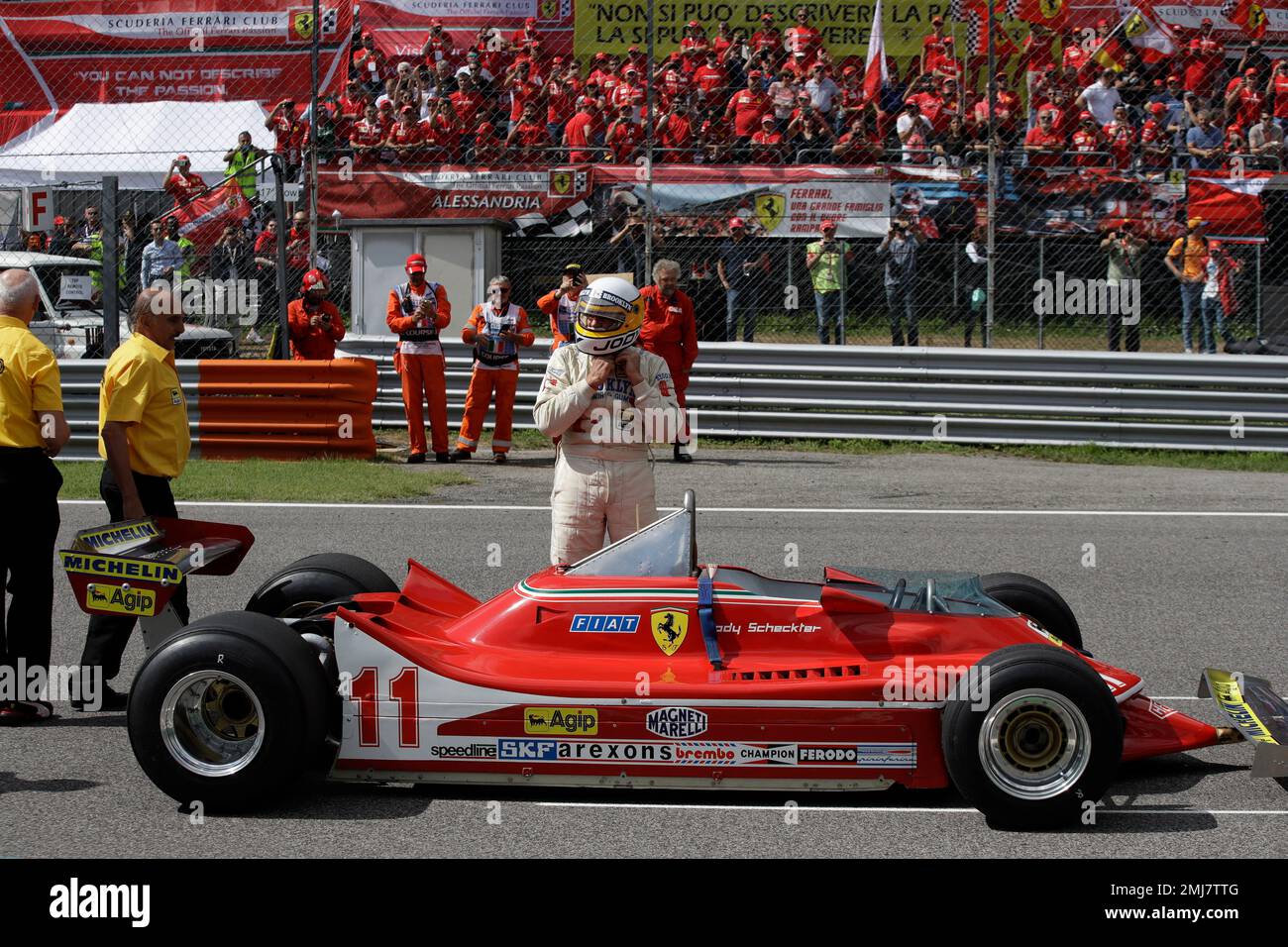 Former Formula One World Champion Jody Scheckter stands behind his 1979 ...