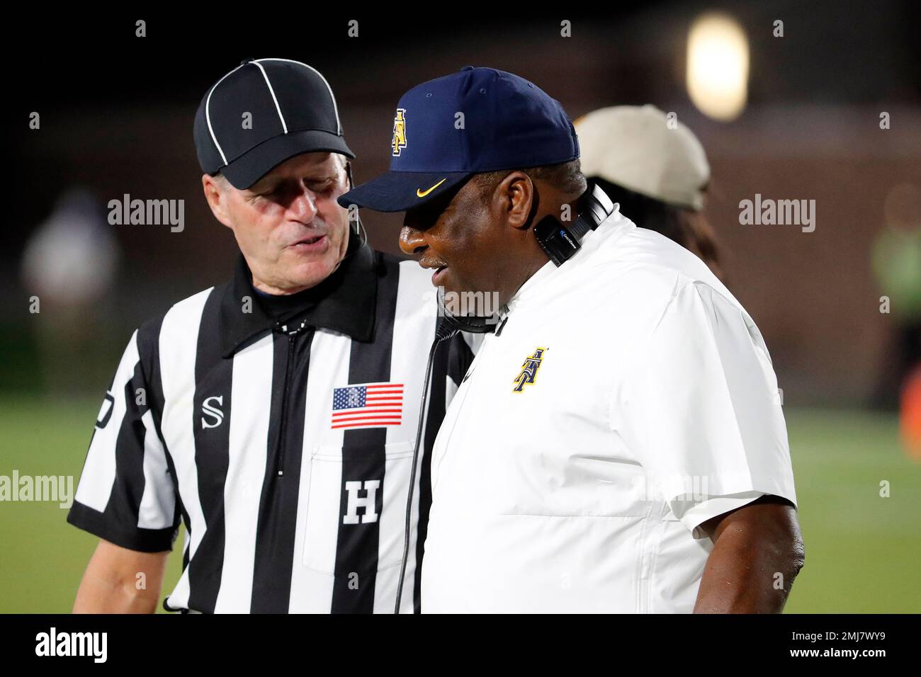 North Carolina A&T head coach Sam Washington speaks to an official ...