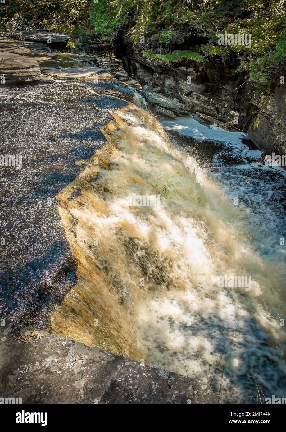 Large water flow from Canyon Falls Northern Michigan Stock Photo - Alamy