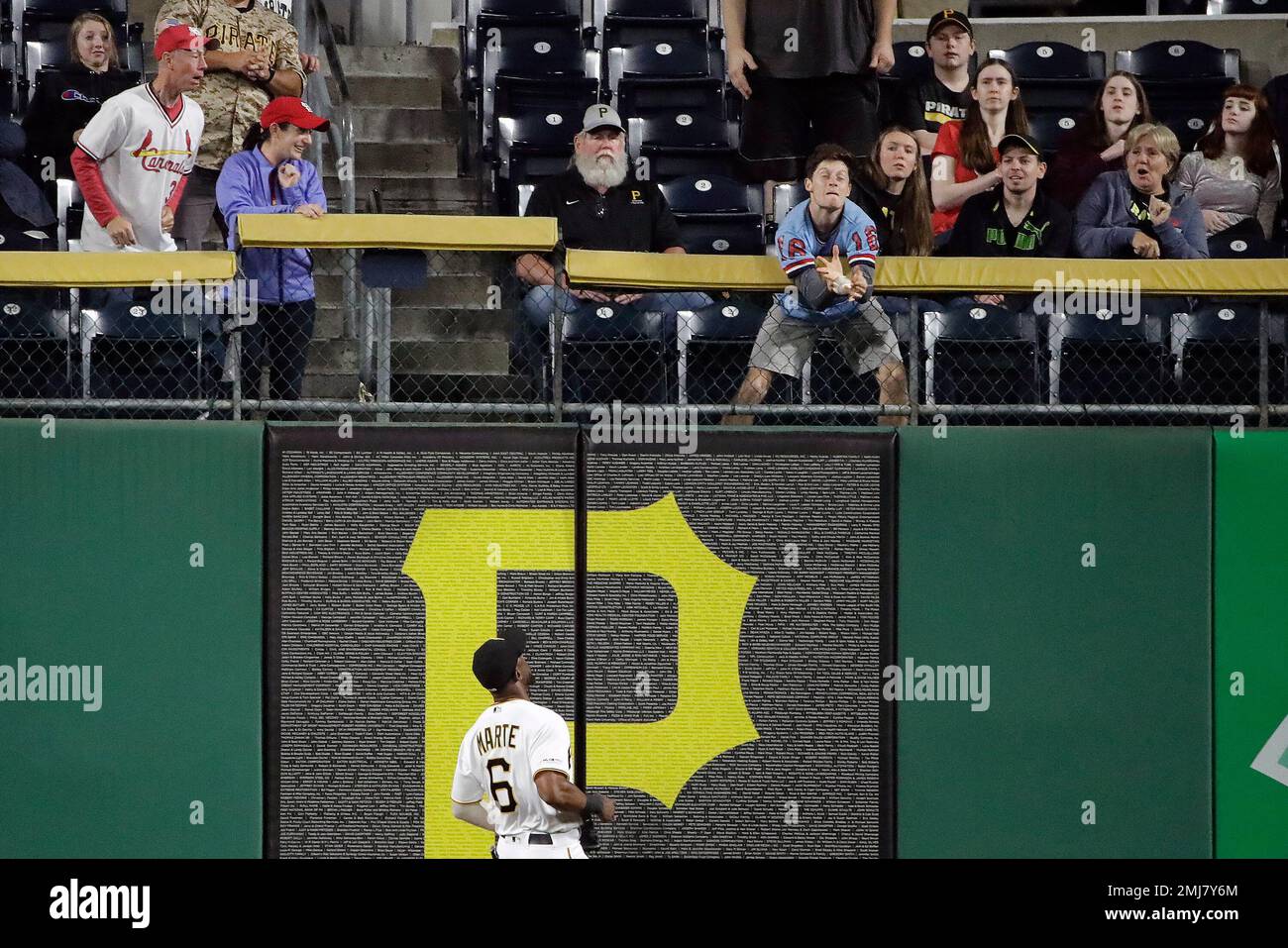 Pittsburgh Pirates center fielder Starling Marte (6) looks up as a fan ...