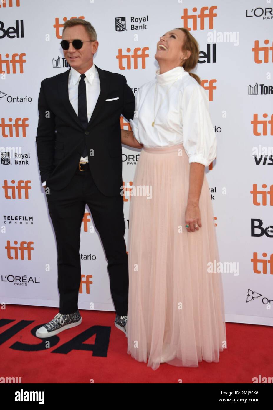 Daniel Craig, left, and Toni Collette attend the premiere for "Knives ...