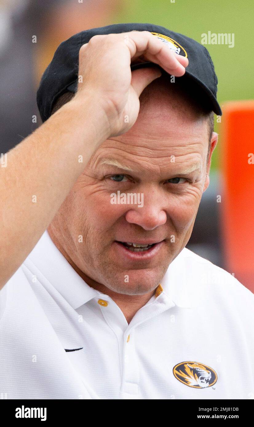Missouri head coach Barry Odom watches his team warm up before the ...