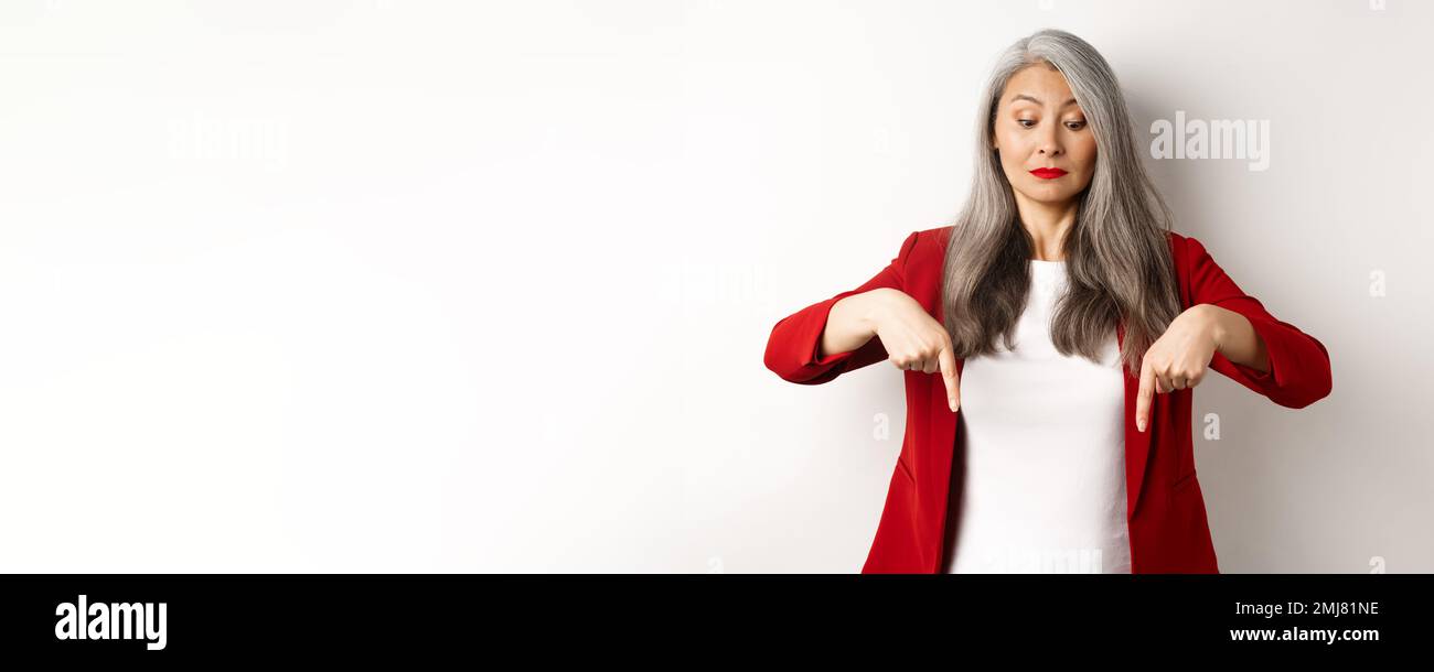 Down intrigued woman looking hi-res stock photography and images - Alamy