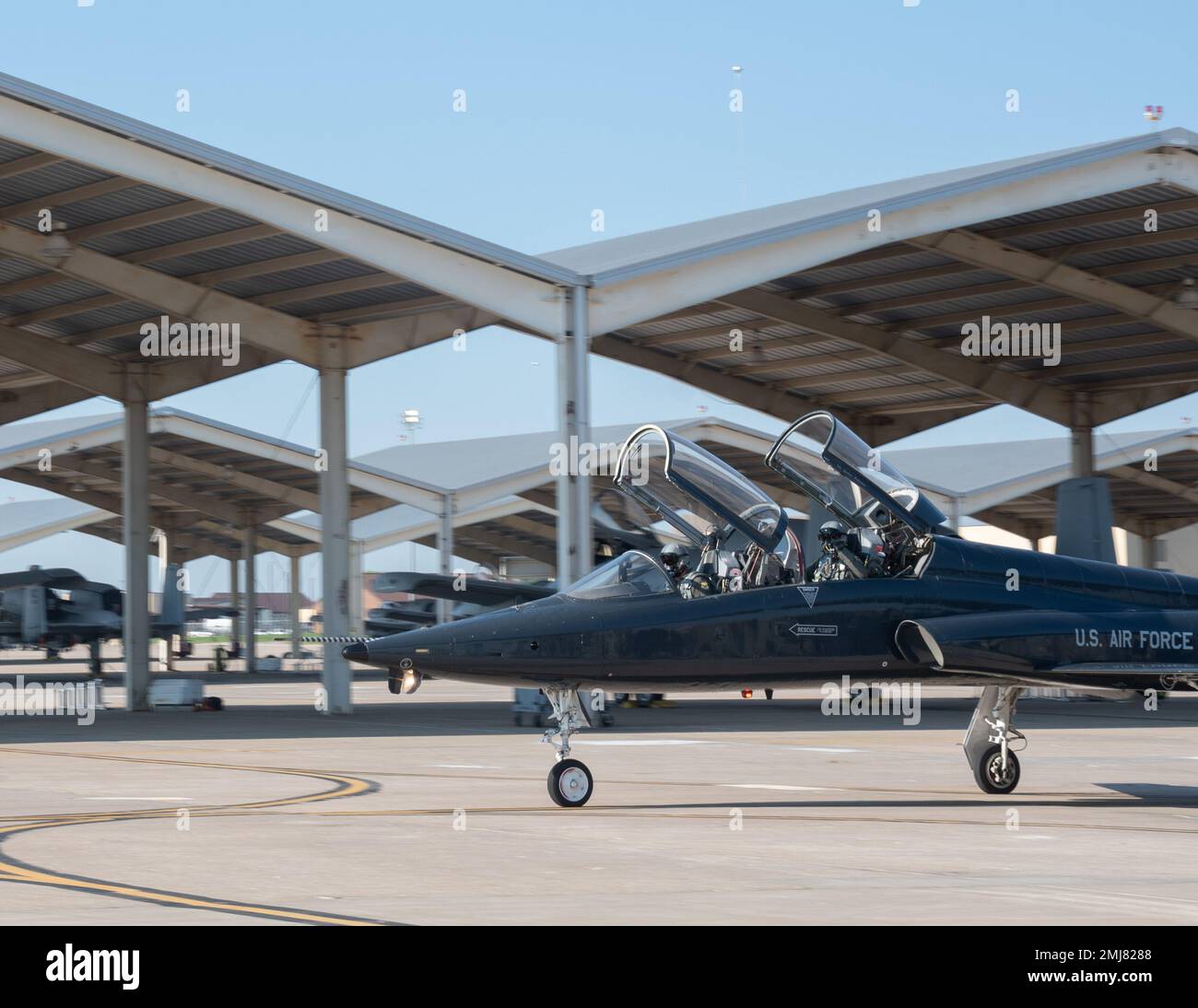 A T-38 Talon jet fighter trainer taxis to the runway at Whiteman Air ...