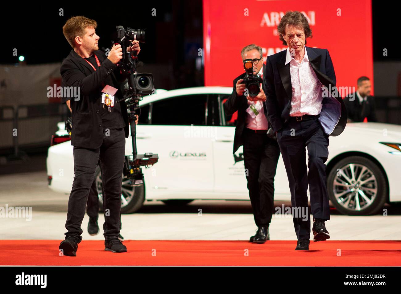 Actor Mick Jagger arrives at the premiere of the film 'The Burnt Orange ...