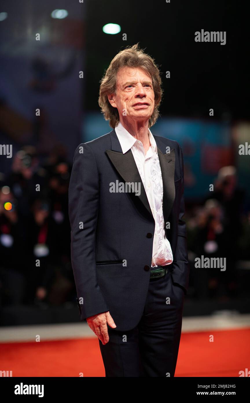 Actor Mick Jagger poses for photographers upon arrival at the premiere ...