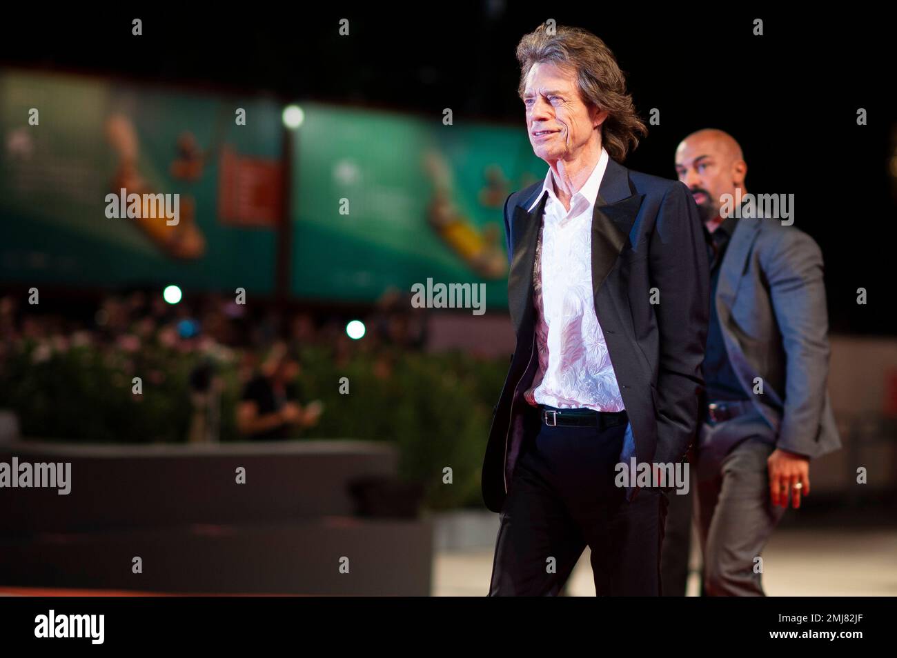 Actor Mick Jagger poses for photographers upon arrival at the premiere ...
