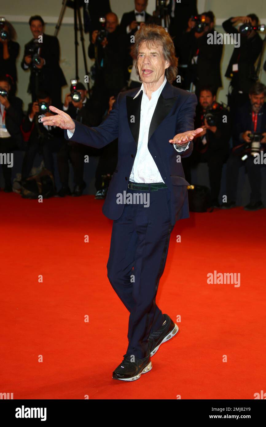 Actor Mick Jagger poses for photographers upon arrival at the premiere ...