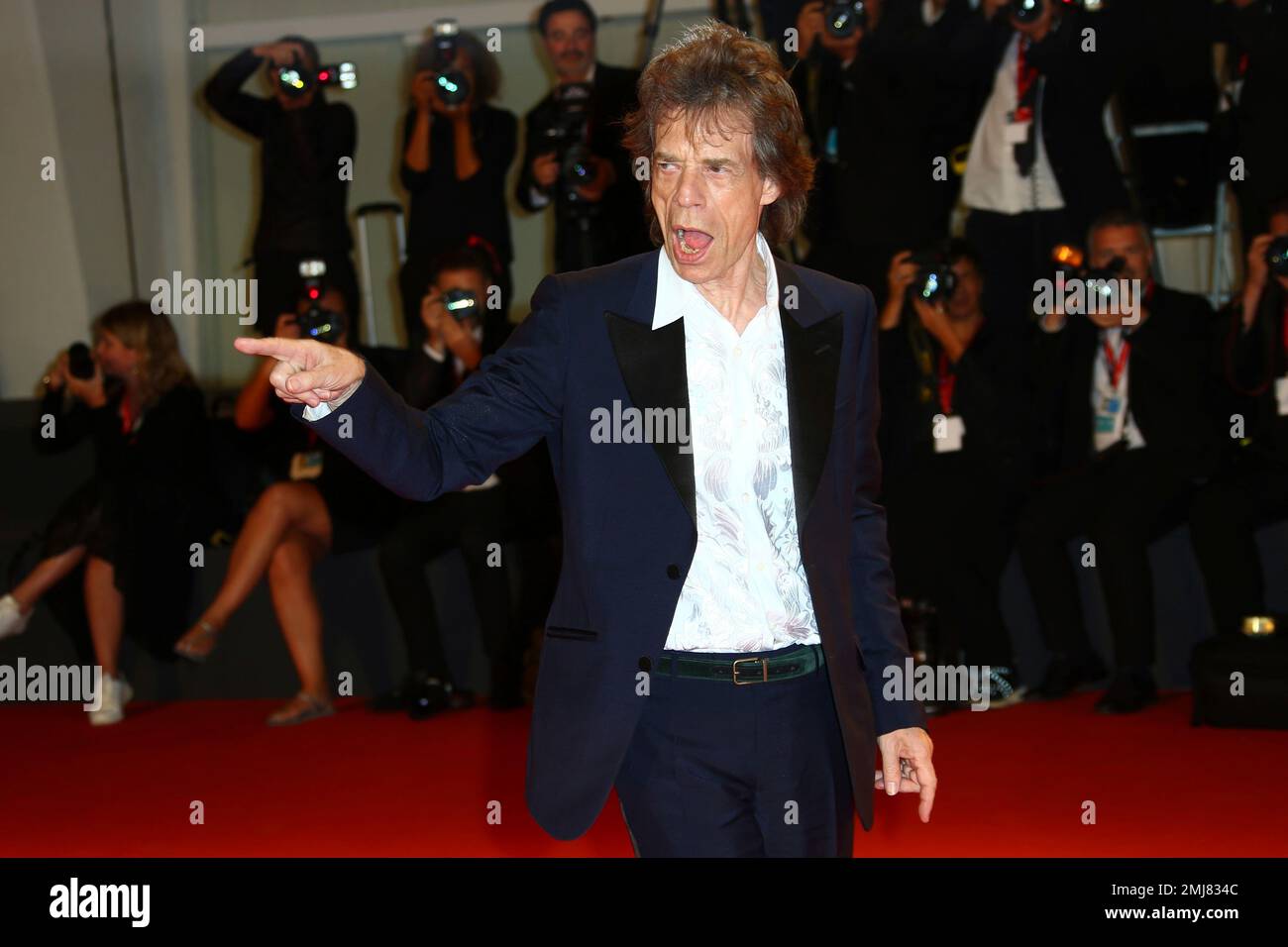 Actor Mick Jagger poses for photographers upon arrival at the premiere ...