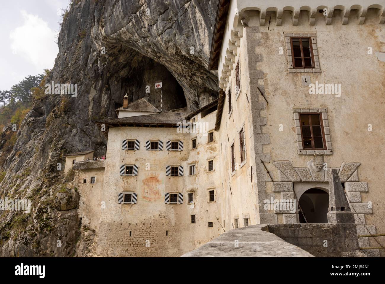 Predjama castle at the cave mouth in Postojna, Slovenia in autumn ...