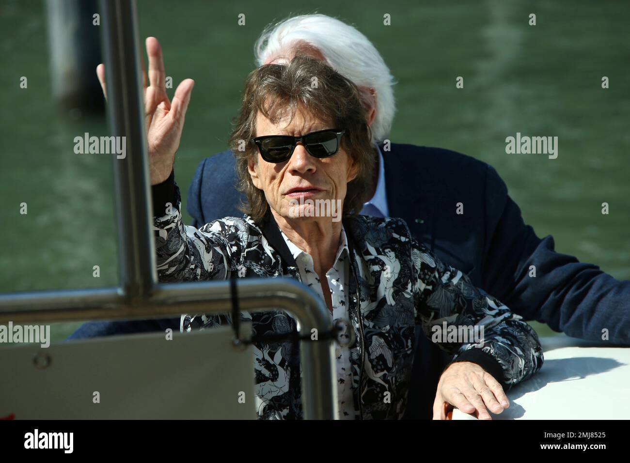 Actor Mick Jagger poses for photographers upon arrival for the photo ...