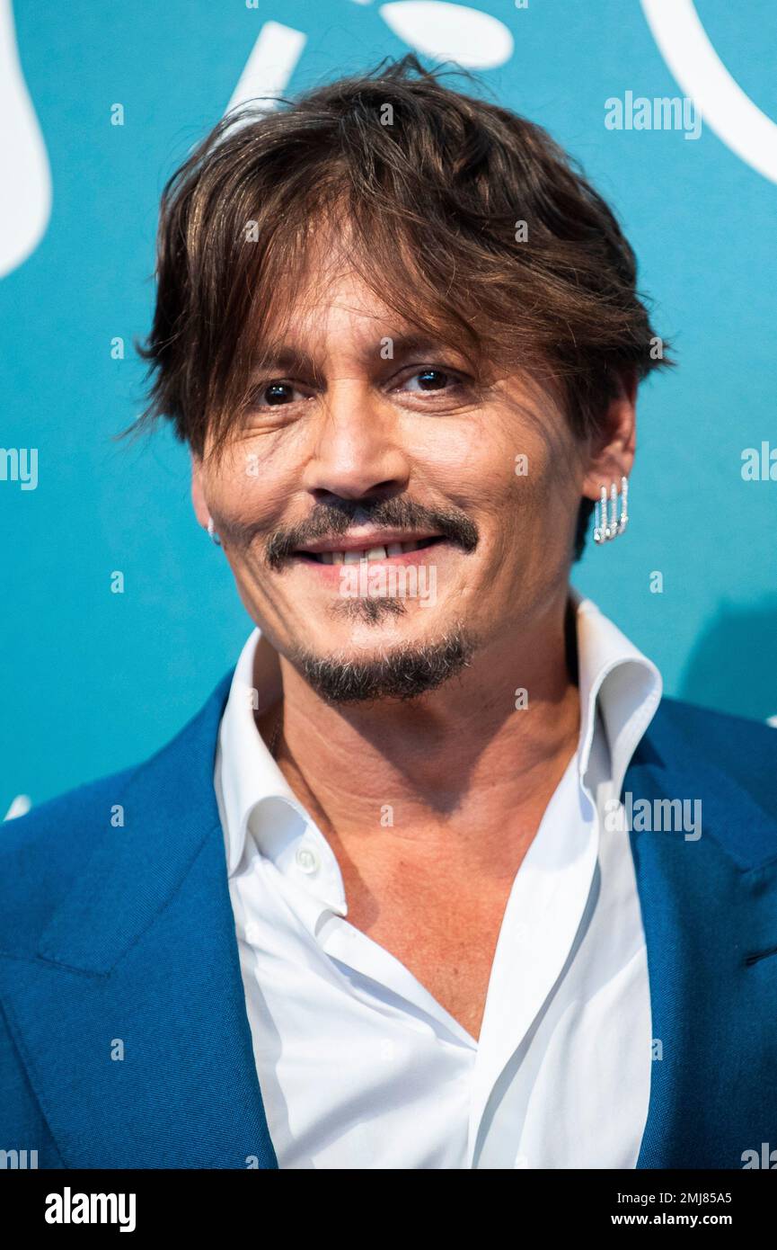 Actor Johnny Depp poses for photographers at the photo call for the ...