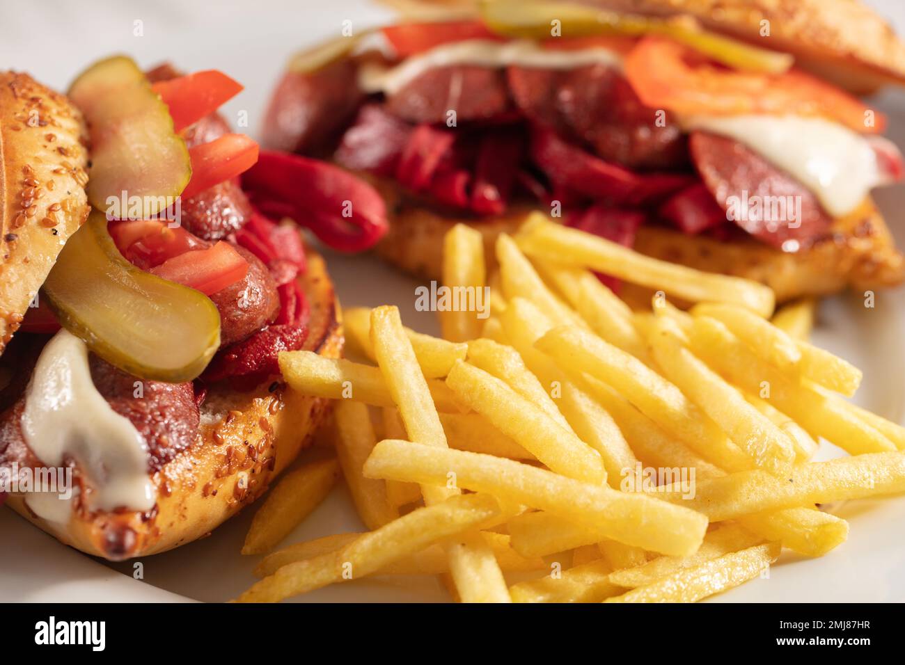 Kumru is a Turkish sandwich on a bun, typically with cheese, tomato ...