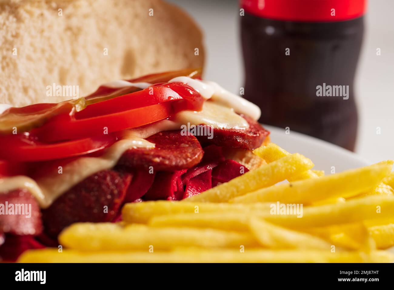 Kumru is a Turkish sandwich on a bun, typically with cheese, tomato ...