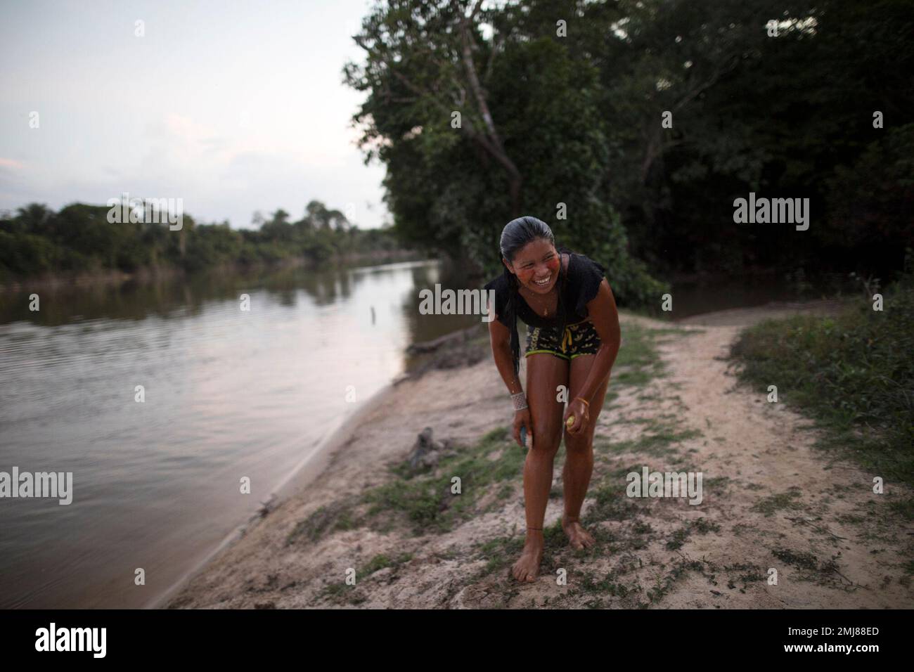 In this Sept. 3, 2019 photo, a woman washes with soap at the Gurupi ...