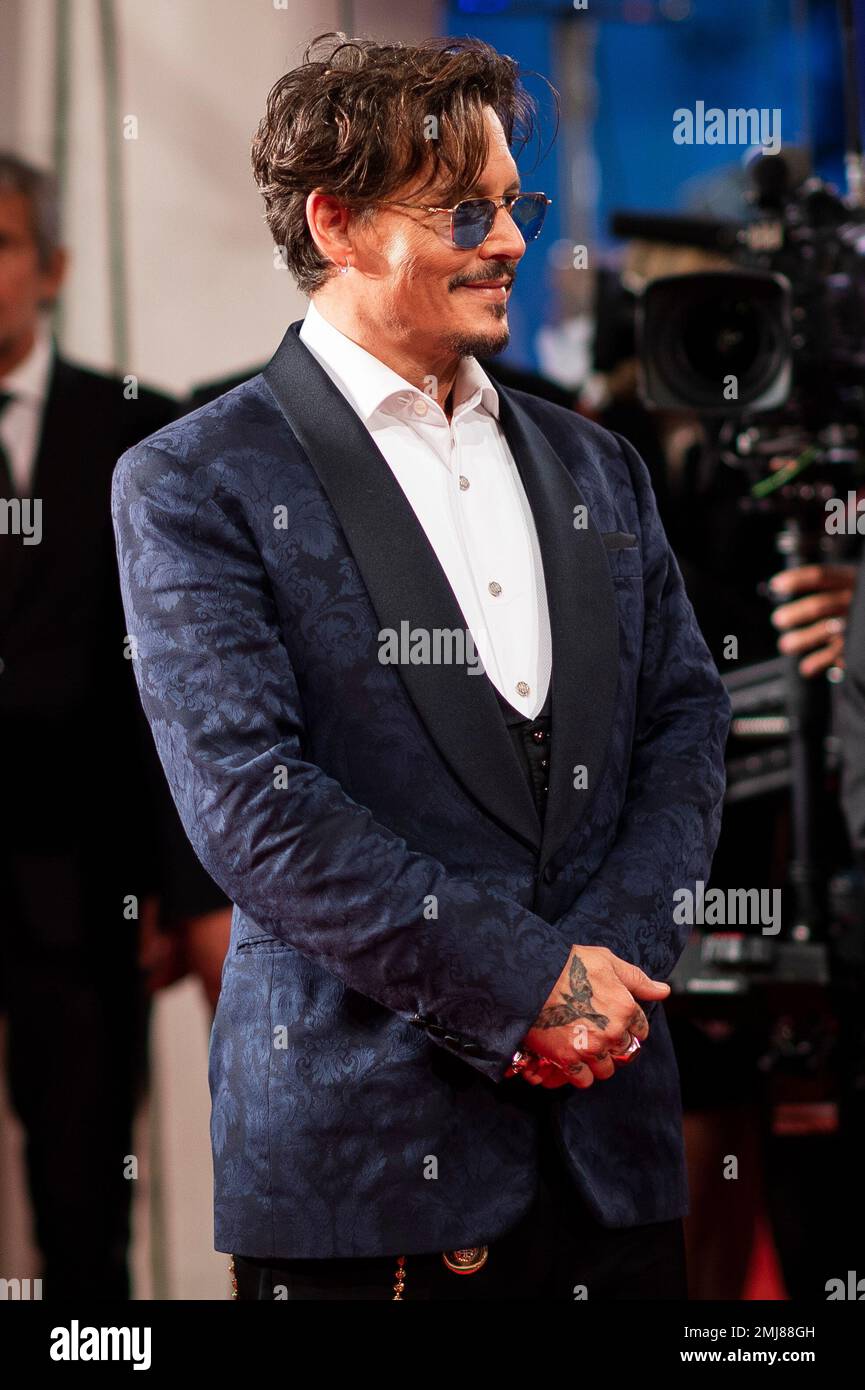Actor Johnny Depp poses for photographers upon arrival at the premiere ...