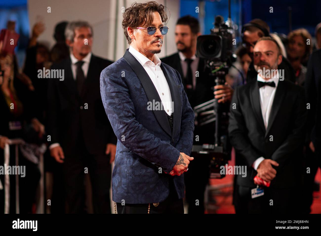 Actor Johnny Depp poses for photographers upon arrival at the premiere ...